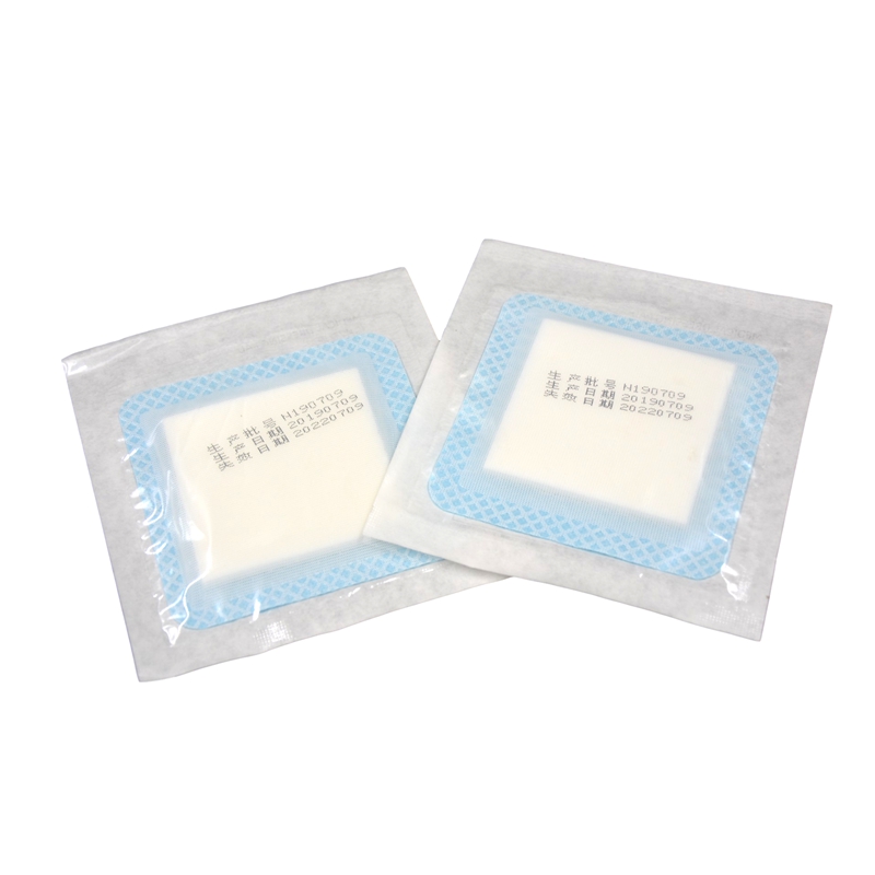 Super absorbent wound dressings with non-adherent contact layer